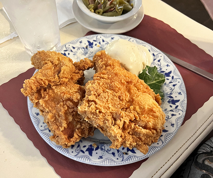 Southern fried chicken with a crust so perfect it deserves its own Instagram account. Crispy on the outside, juicy on the inside—nature's perfect food.