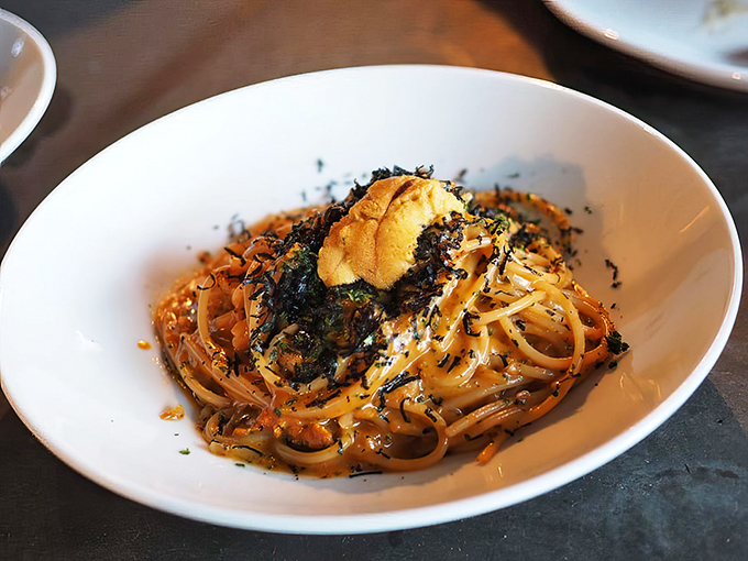 The legendary spaghetti rustichella topped with sea urchin&mdash;pasta alchemy that transforms simple strands into gold through the magic of umami.