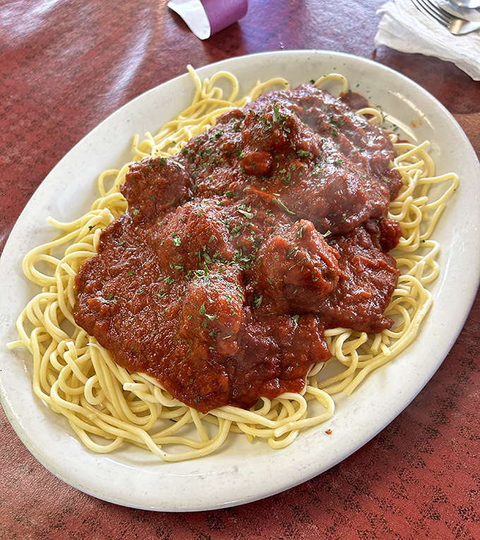 Spaghetti and meatballs so classic, it looks like it walked straight off the set of "Lady and the Tramp" and onto your table.