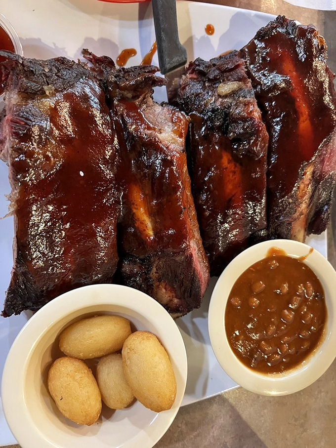 These ribs aren't just smoked; they're transformed. The sauce doesn't hide the meat's character—it celebrates it like a perfect backup singer.
