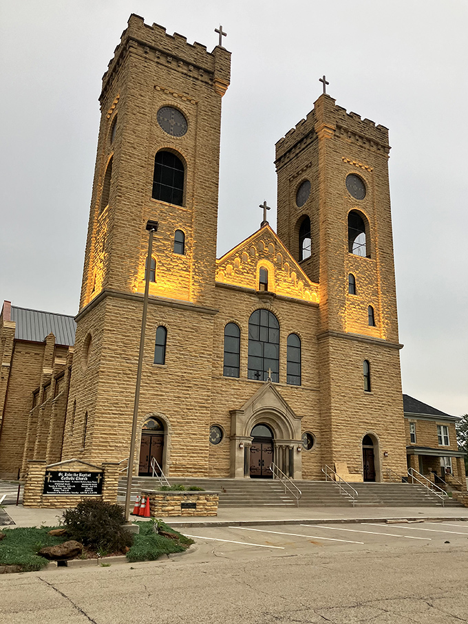 St. John the Baptist Catholic Church stands majestically with its twin towers, architectural grandeur that would cost millions to build today.