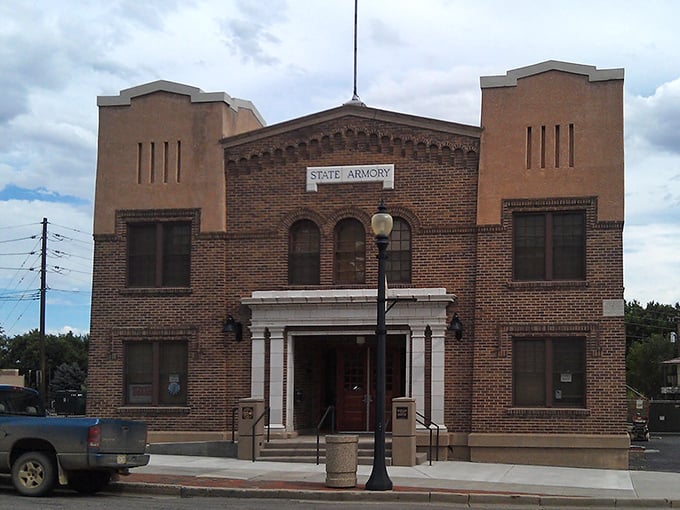 The State Armory building now guards the town's heritage rather than ammunition, a sturdy reminder of Ca&ntilde;on City's practical roots.