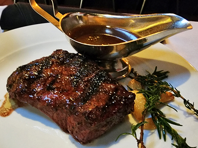 A perfectly seared steak with a sauce boat nearby&mdash;like having a life raft when you're already in heaven.