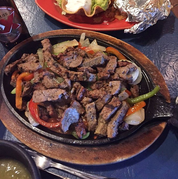 Sizzling fajitas announce their arrival with theatrical flair &ndash; a sensory overture of sound, smell, and steam that turns every head in the dining room.