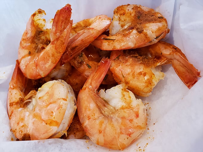 These steamed shrimp aren't just food; they're little pink pillows of oceanic perfection, seasoned just enough to enhance their natural sweetness.