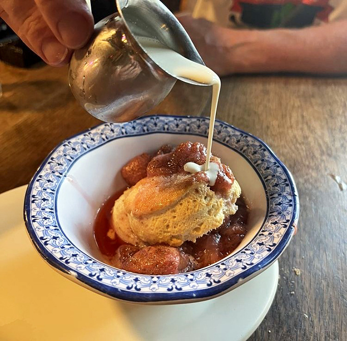 Watching cream cascade over warm strawberry shortcake feels like witnessing a small miracle. Comfort food that speaks a universal language.