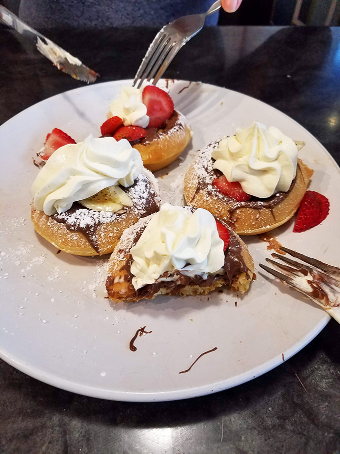 Dessert masquerading as breakfast? These strawberry-topped pancakes with whipped cream make a compelling case for starting your day with something sweet.