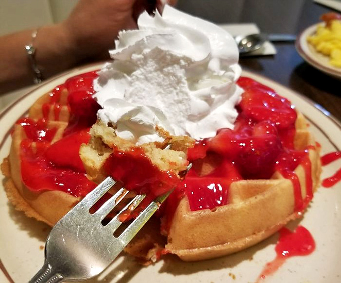 These strawberry waffles aren't just breakfast&mdash;they're dessert with an alibi. That whipped cream mountain isn't fooling anyone.