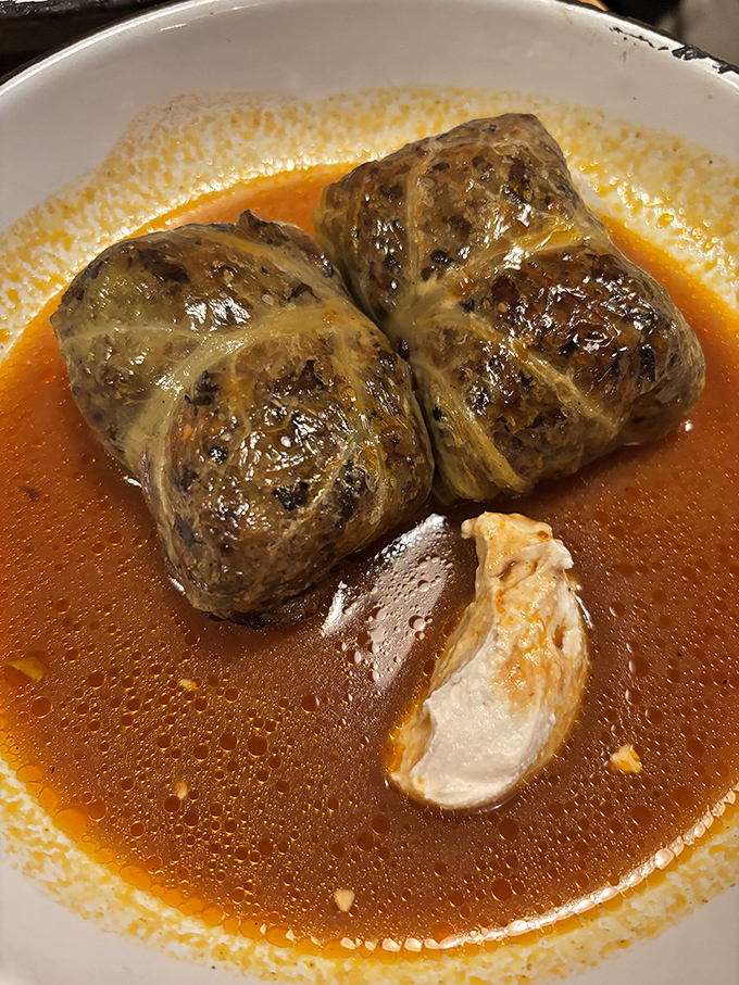 Stuffed cabbage rolls bathing in a rich tomato broth&mdash;like edible time machines transporting you to a Warsaw kitchen from another era.