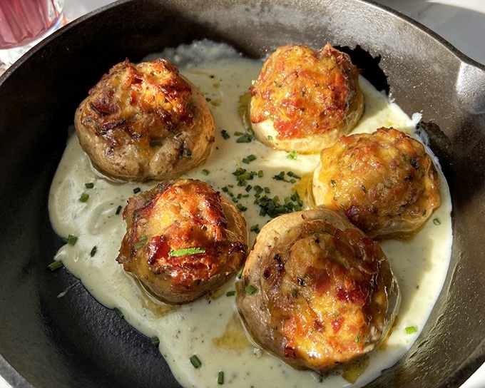 Stuffed mushrooms swimming in cream sauce&mdash;proof that vegetables can be decadent when they put their minds to it.