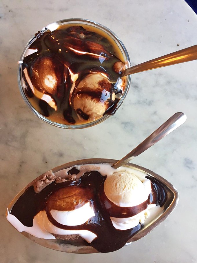 Hot fudge cascading over ice cream like chocolate lava. This sundae isn't just dessert&mdash;it's performance art with a deliciously sweet finale.