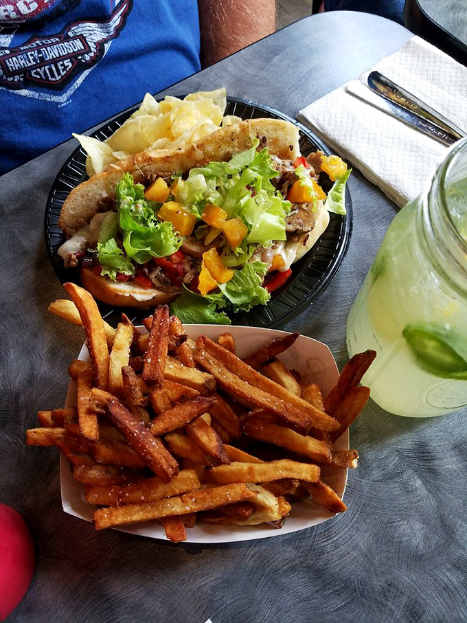 A sandwich that requires both hands and several napkins is a sandwich worth having. Those sweet potato fries aren't just sides—they're supporting actors deserving of their own spotlight.