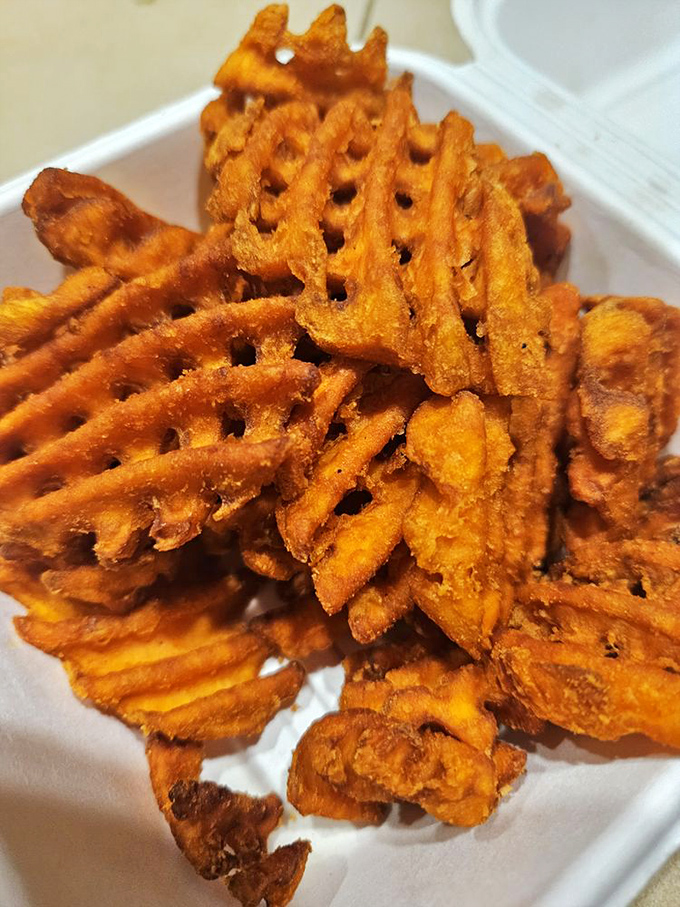 Sweet potato waffle fries that crunch like autumn leaves&mdash;a golden-orange treasure that somehow feels both indulgent and virtuous.