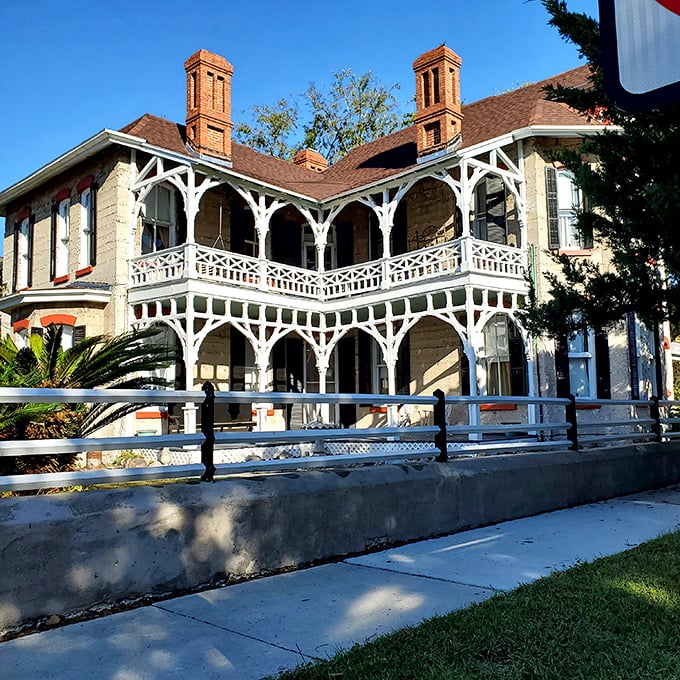 The Tabby House's intricate woodwork and wraparound porches whisper tales of genteel Southern living, when afternoon conversations were an art form.