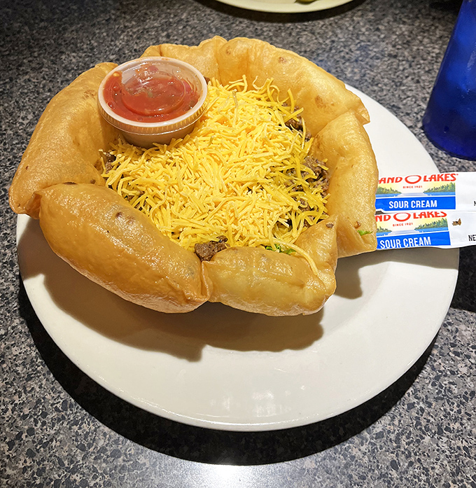 Not your average taco salad! This edible bowl cradles a mountain of ingredients that transforms the humble salad into a main event worth celebrating. 