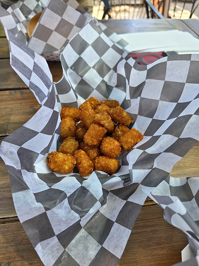 Golden-brown tater tots that crunch like childhood memories but taste like grown-up culinary achievement. Potato perfection in bite-size form.