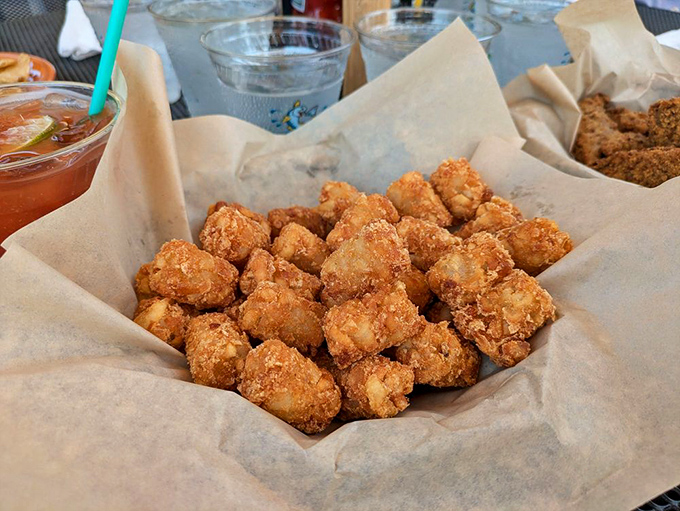 Tater tots&mdash;childhood nostalgia upgraded for your adult palate. Crispy outside, fluffy inside, and absolutely impossible to share.