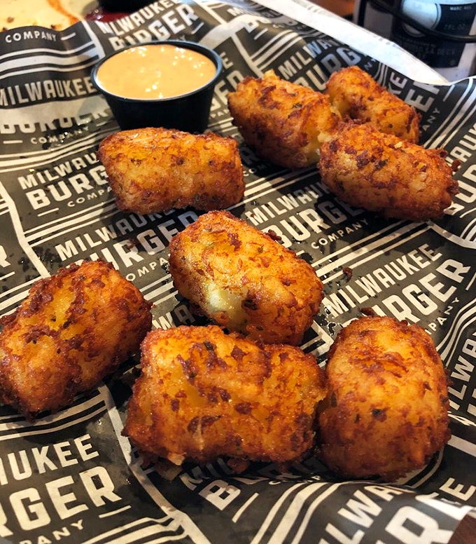 These aren't your average tater tots&mdash;they're golden-brown flavor grenades waiting to explode with cheesy goodness in your mouth.