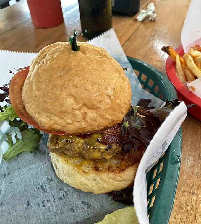 The burger that reminds you why we invented buns in the first place. That golden dome of bread is the Sistine Chapel ceiling of sandwich architecture.