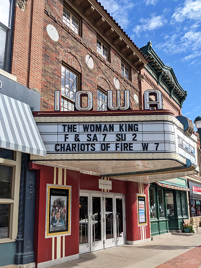The Iowa Theater's vintage marquee promises classic films and new releases in a setting that makes multiplexes feel as soulless as airport terminals.