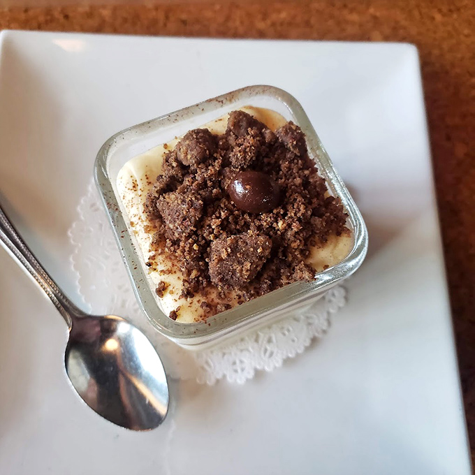 This isn't just dessert, it's therapy in a glass. Creamy custard topped with chocolate crumble creates the kind of moment you'll reminisce about later.
