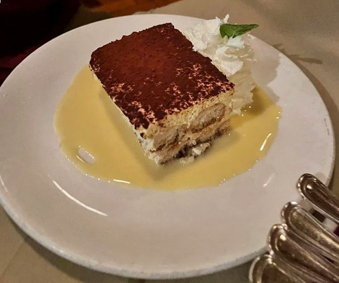 Tiramisu swimming in a pool of vanilla sauce. When a restaurant known for meat creates a dessert this good, you know they're not messing around.