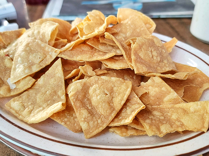 House-made tortilla chips that crackle with authenticity &ndash; the kind that make store-bought versions hang their heads in shame.