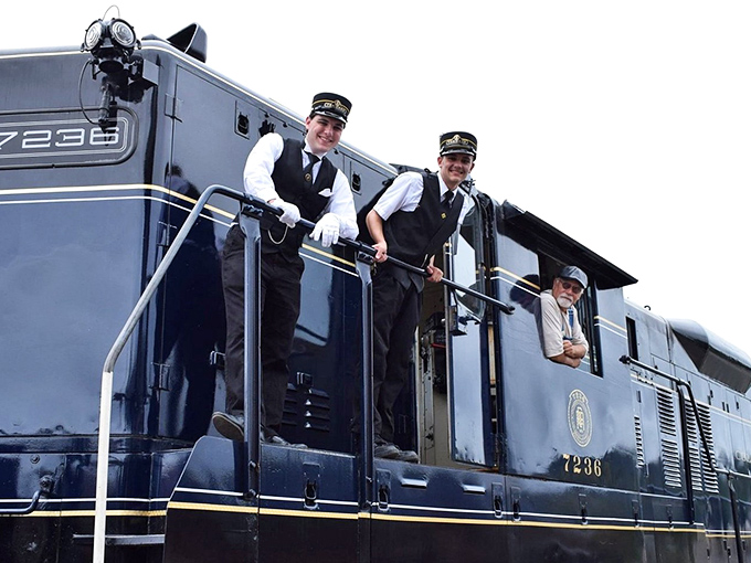 The guardians of railroad tradition, these conductors bring history to life with every journey. Their smiles say "Welcome to 1910!"