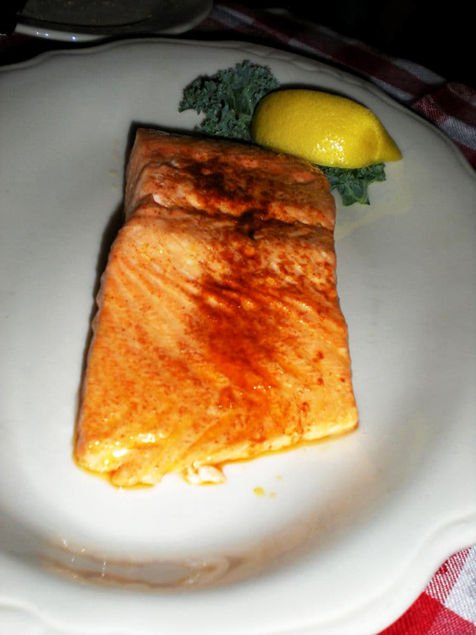 Salmon cooked to that magical moment between firm and flaky. The gentle char marks are like nature's signature on a masterpiece. 