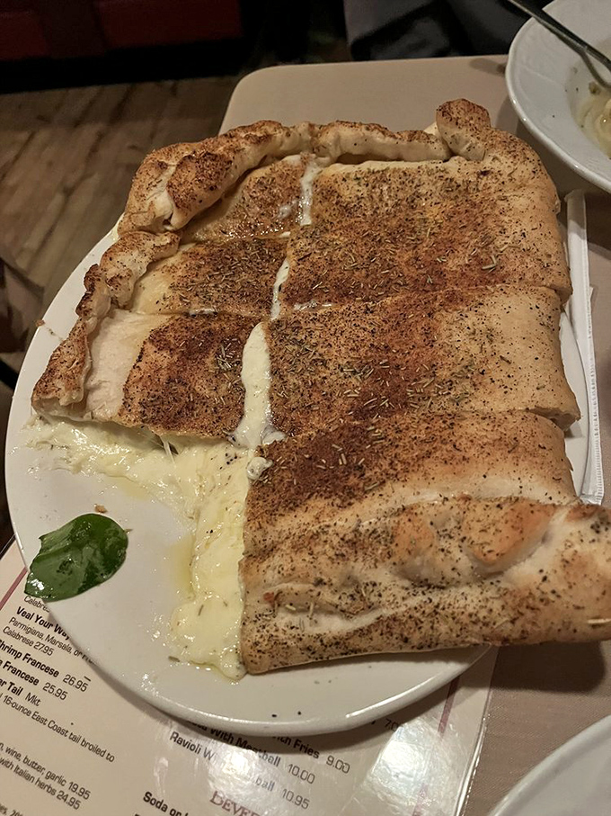 Whoever invented this cheese-laden creation deserves a Nobel Prize. The perfect marriage of crispy crust and melty indulgence.