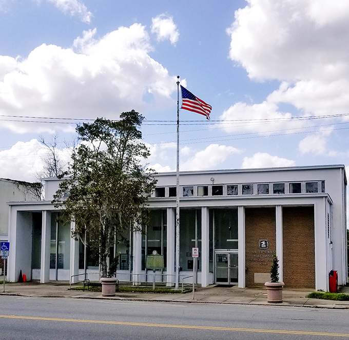 This isn't just a post office; it's small-town America's social hub where mail delivery comes with a side of community news and friendly conversation.
