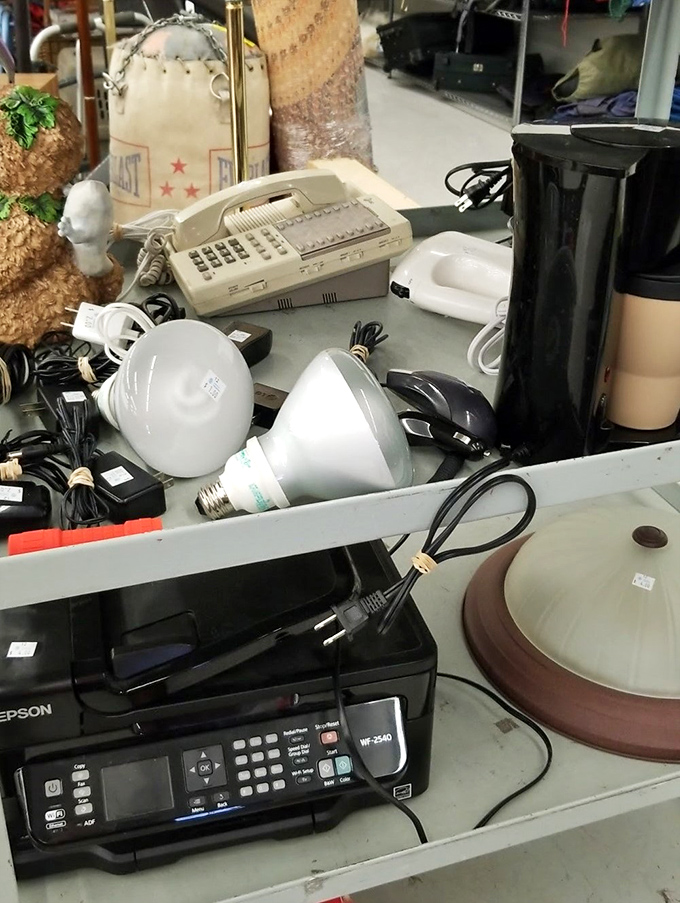 Electronics heaven or tech purgatory? That Epson printer and vintage fax machine represent the circle of technological life.