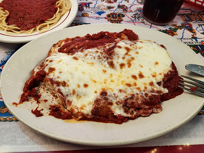 Veal parmigiana that doesn't hide under its cheese blanket – it proudly announces "This is why elastic waistbands were invented!"