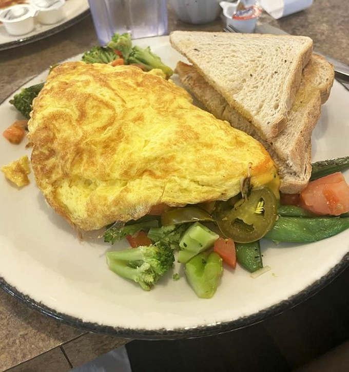 That fluffy omelet packed with fresh vegetables is basically a garden party your taste buds are invited to.