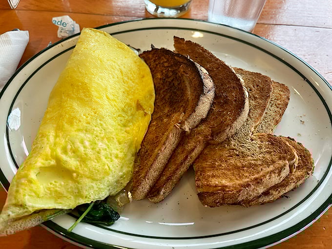 An omelet so fluffy it could star in a fabric softener commercial &ndash; with toast that knows its supporting role.