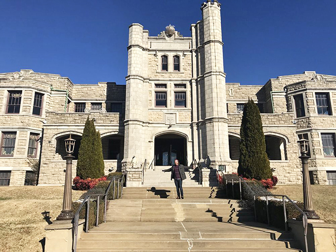 The grand entrance beckons visitors into a world where Missouri and medieval fantasy collide. Those steps have welcomed everyone from orphans to POWs.