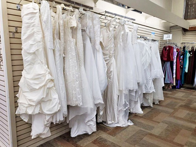 Wedding dress heaven! Something borrowed becomes something new again. These gowns hold memories of special days and await their next walk down the aisle.