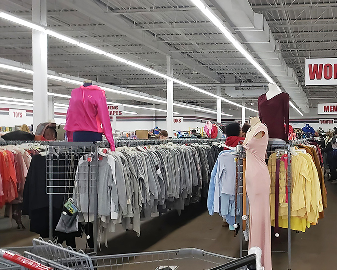 Fashion democracy in action. Where else can a burgundy evening gown rub shoulders with casual yellow blouses while gray blazers stand at attention nearby?