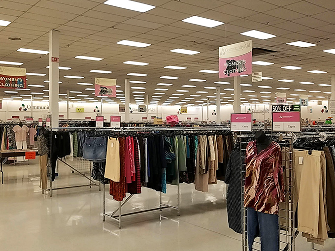 The women's clothing section stretches toward the horizon, a sea of possibilities where vintage treasures hide among everyday finds.