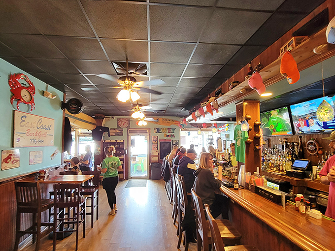Inside Woody's, where the décor says "beach casual" and the vibe whispers "stay for another round, friend."