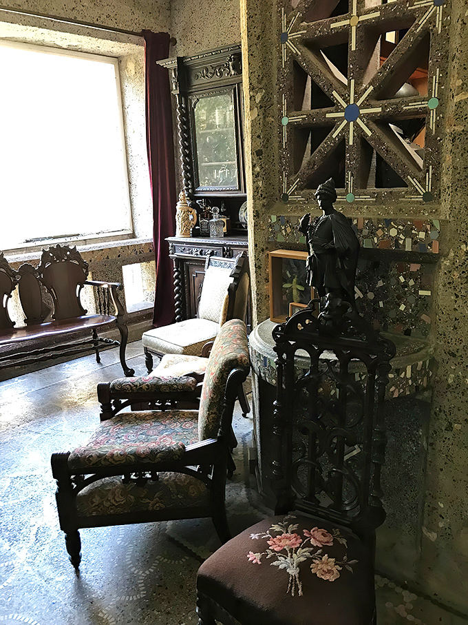 The antique-furnished sitting room whispers stories from another era, with each carefully preserved piece inviting contemplation.