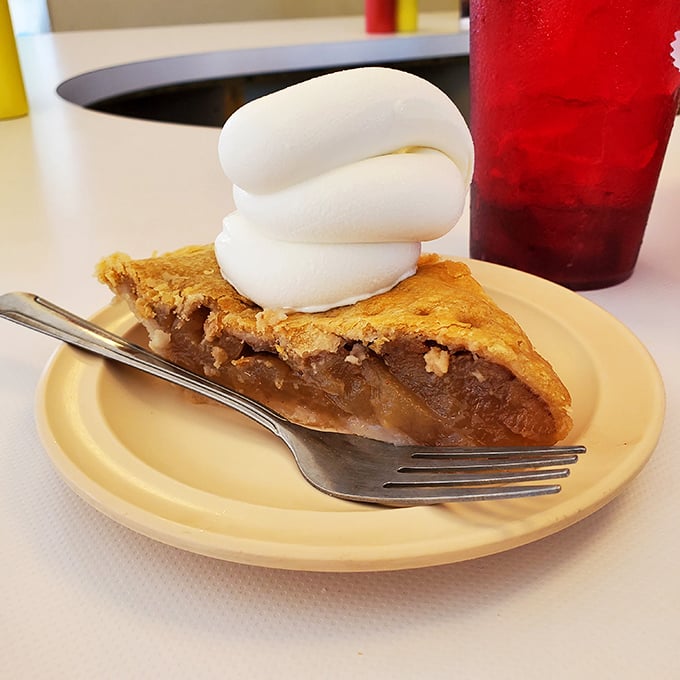 Apple pie à la mode: the dessert equivalent of a warm hug from your favorite grandparent, with ice cream melting into flaky, cinnamon-scented perfection.