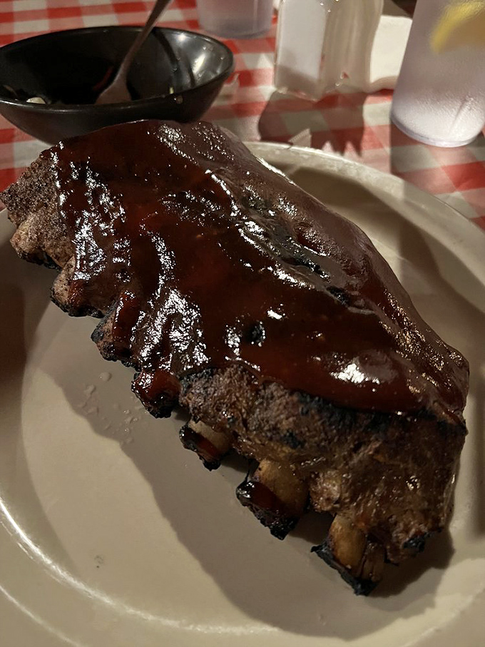 These ribs aren't just falling off the bone&mdash;they're practically jumping onto your fork, glazed with a sauce worth licking off your fingers.