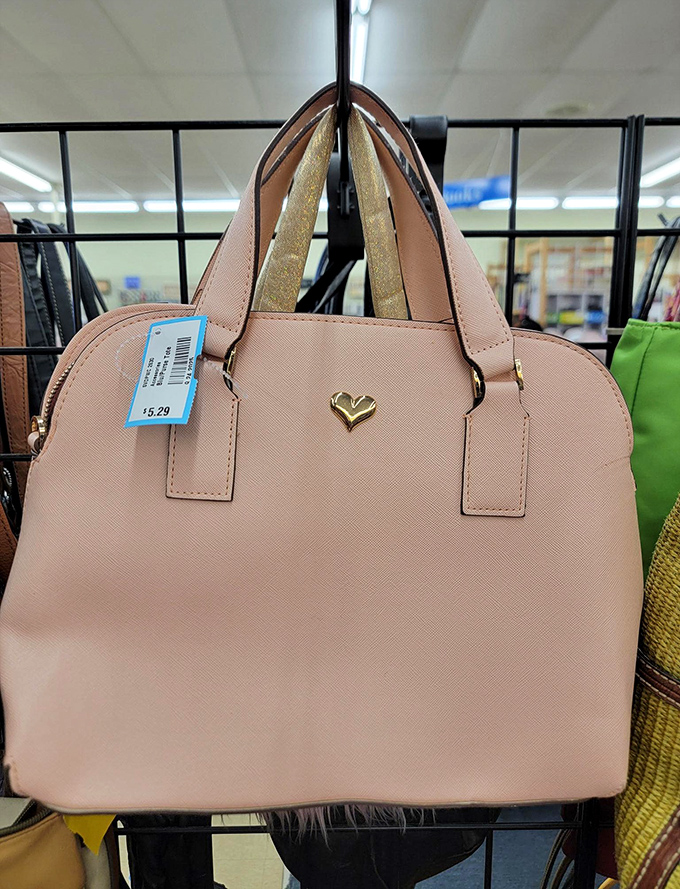 Blush perfection with a golden heart. This handbag looks straight from a department store display, not a thrift shop rack.