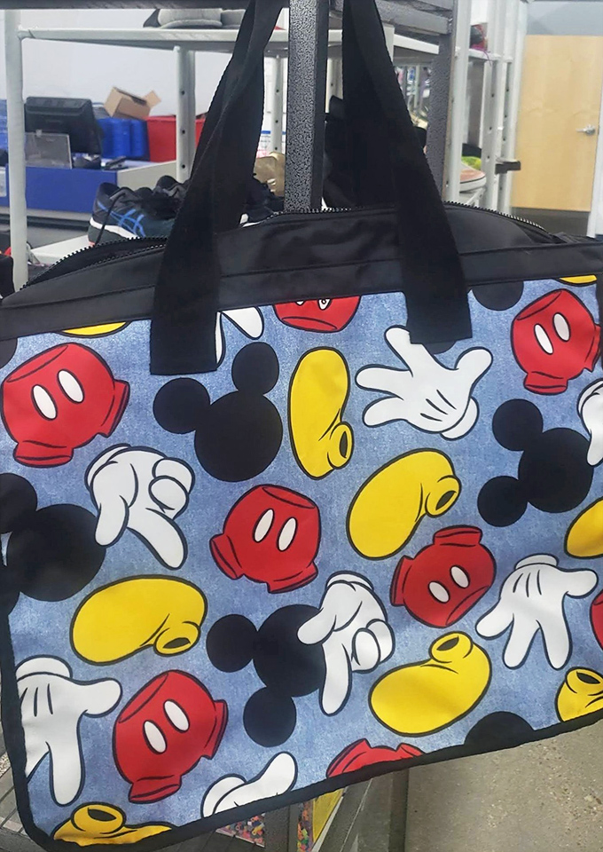 Mickey Mouse duffel that proves Disney magic doesn't require Disney prices. Someone's park souvenir becomes your conversation-starting carryall.