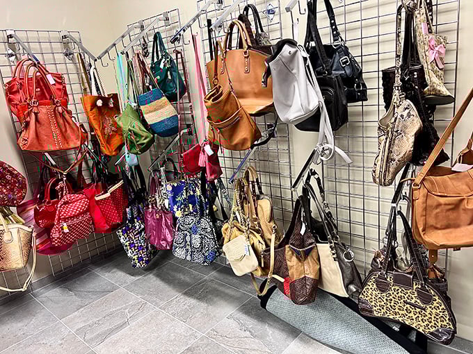 Handbag heaven! Designer totes mingle with everyday purses in this colorful display that makes accessorizing affordable for everyone. Photo credit: <a href="https://maps.google.com/maps/contrib/103230611686909625641" target="_blank" rel="noopener noreferrer">Dee K</a>