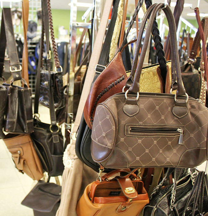 Handbag heaven! Designer-looking purses dangling like leather and vinyl fruit, ripe for the picking at a fraction of retail prices.