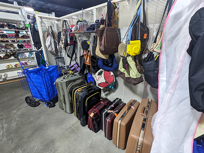 The accessories corner—where yesterday's fashion statements become tomorrow's vintage finds. That yellow handbag is practically screaming your name.