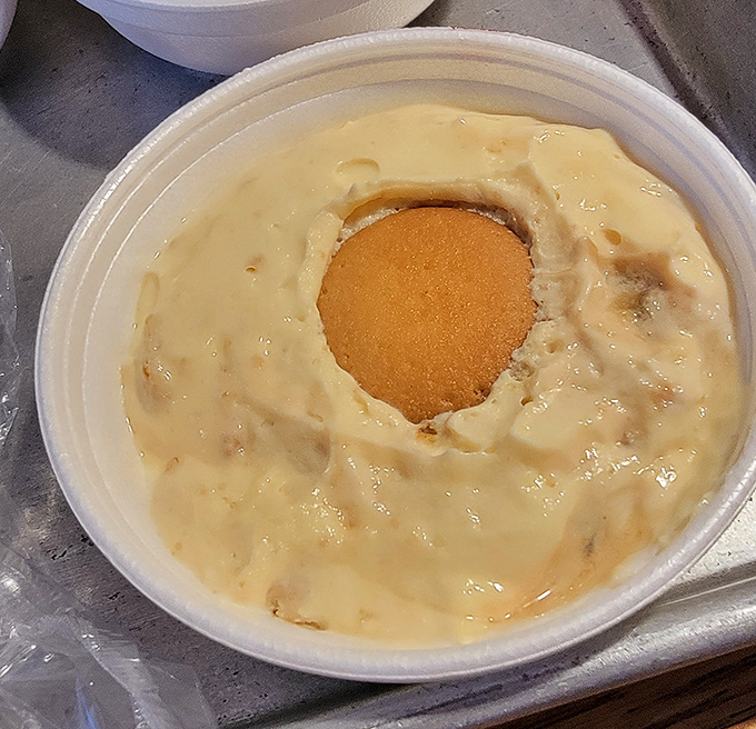 Banana pudding with a vanilla wafer crown—the dessert equivalent of a warm hug from your favorite aunt after a Sunday dinner.