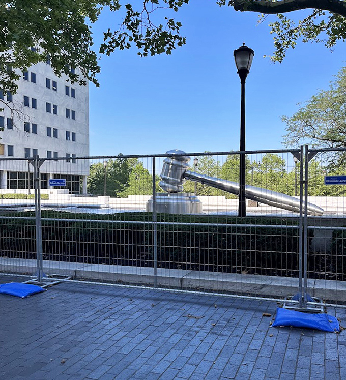 "Sorry, the court is temporarily in recess." Even behind construction fencing, the giant gavel commands attention against the bright blue Ohio sky.